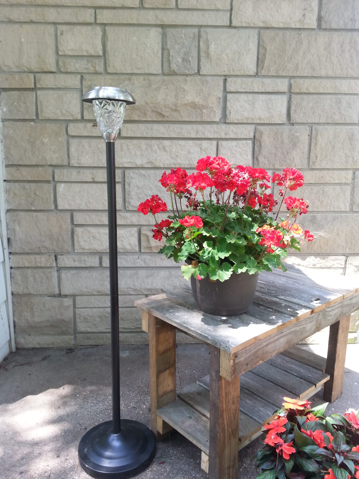 Repurposed Floor Lamps make great patio solar lights